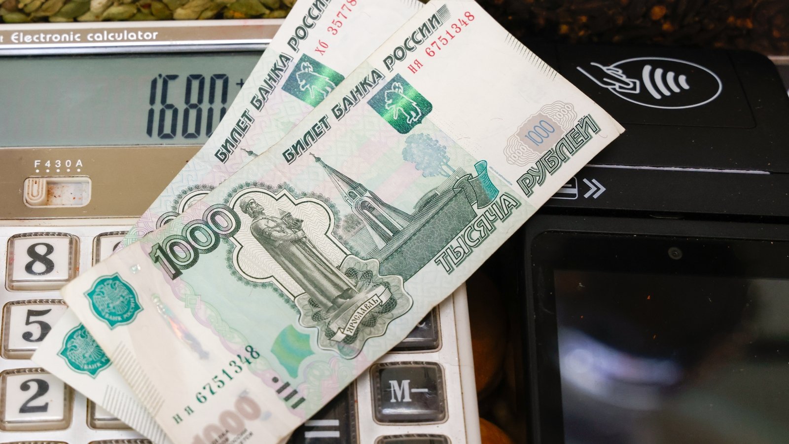 Russian rouble slides further after ratings downgrades