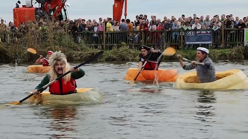 Giant floating pumpkin relay race
