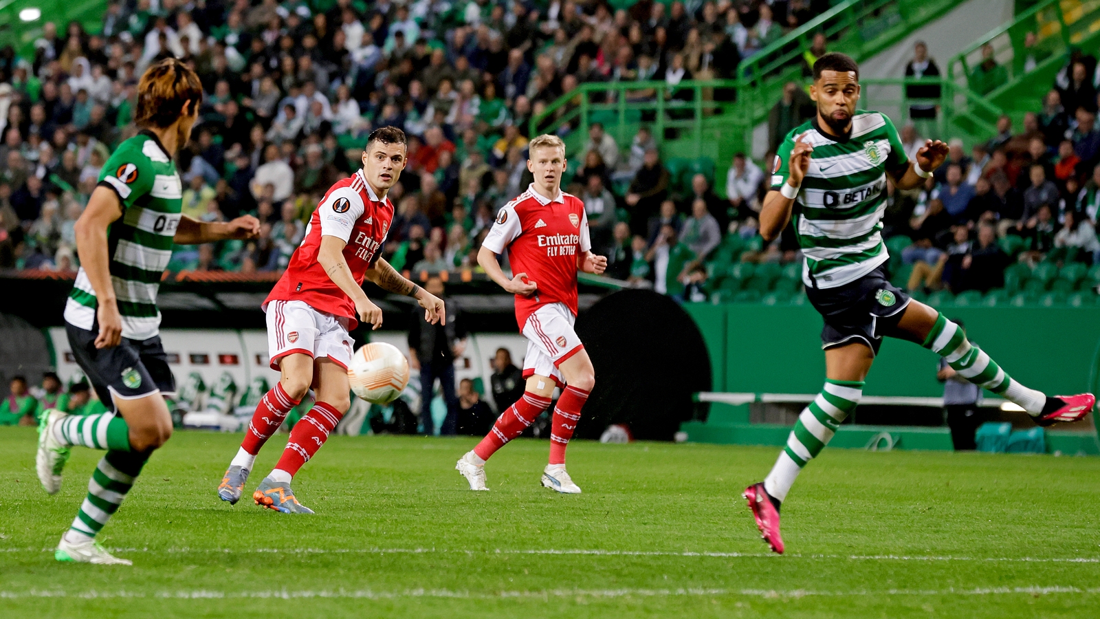 Arsenal fight back to level in Lisbon