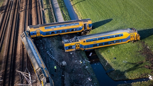 One dead, 30 injured as Dutch train hits crane