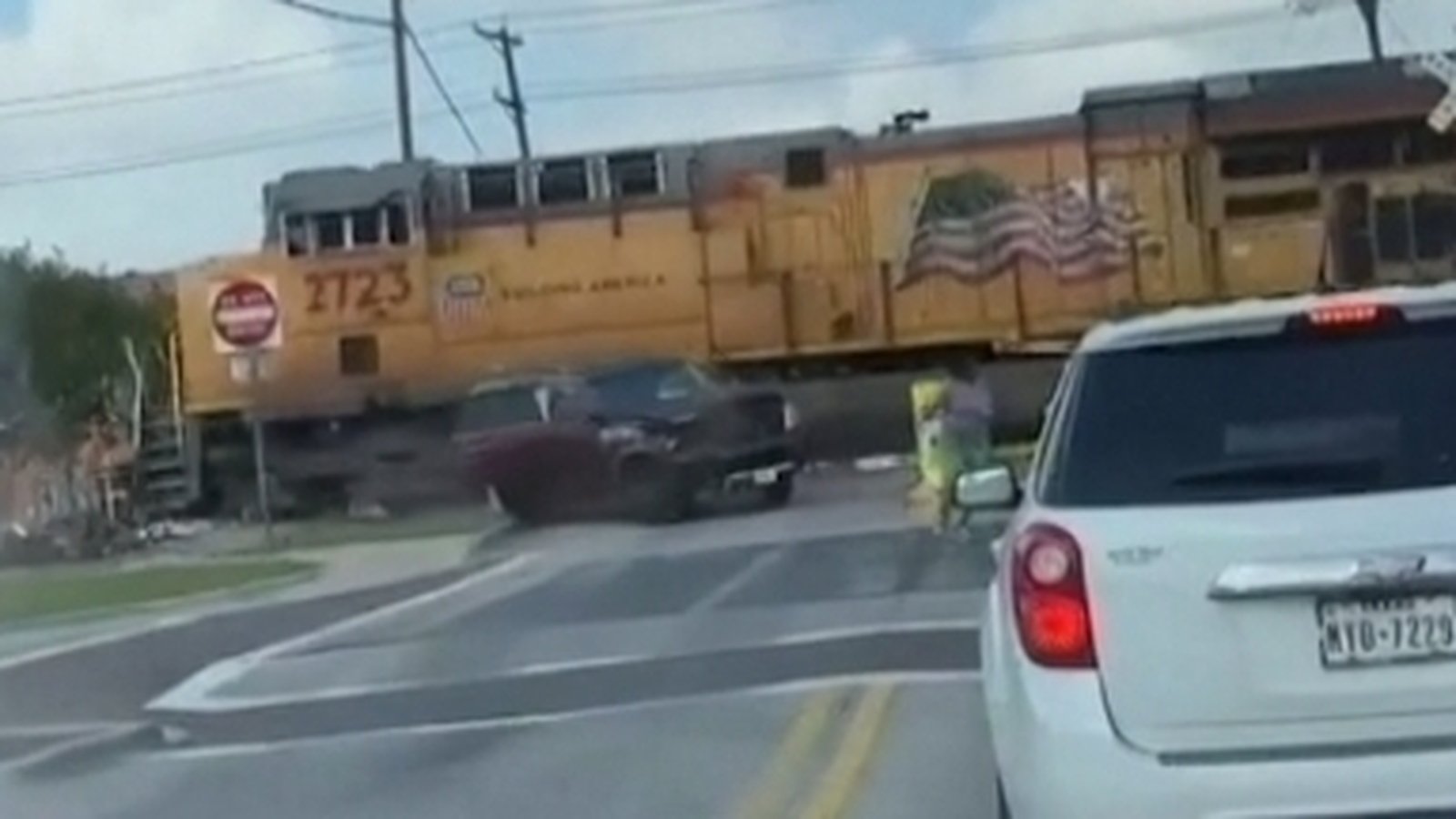 Narrow escape for passengers as train crashes into car