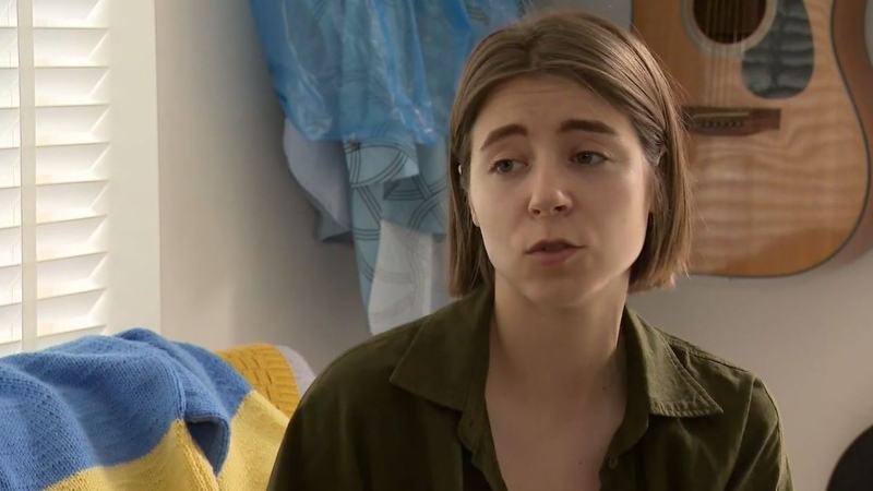 Ukrainian awaits news of family in path of flood waters