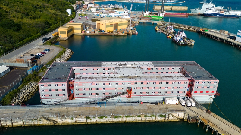 What will life be like for migrants aboard UK barge?