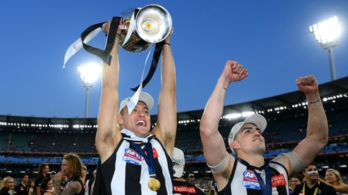 Collingwood claim AFL title as McKenna's Brisbane lose