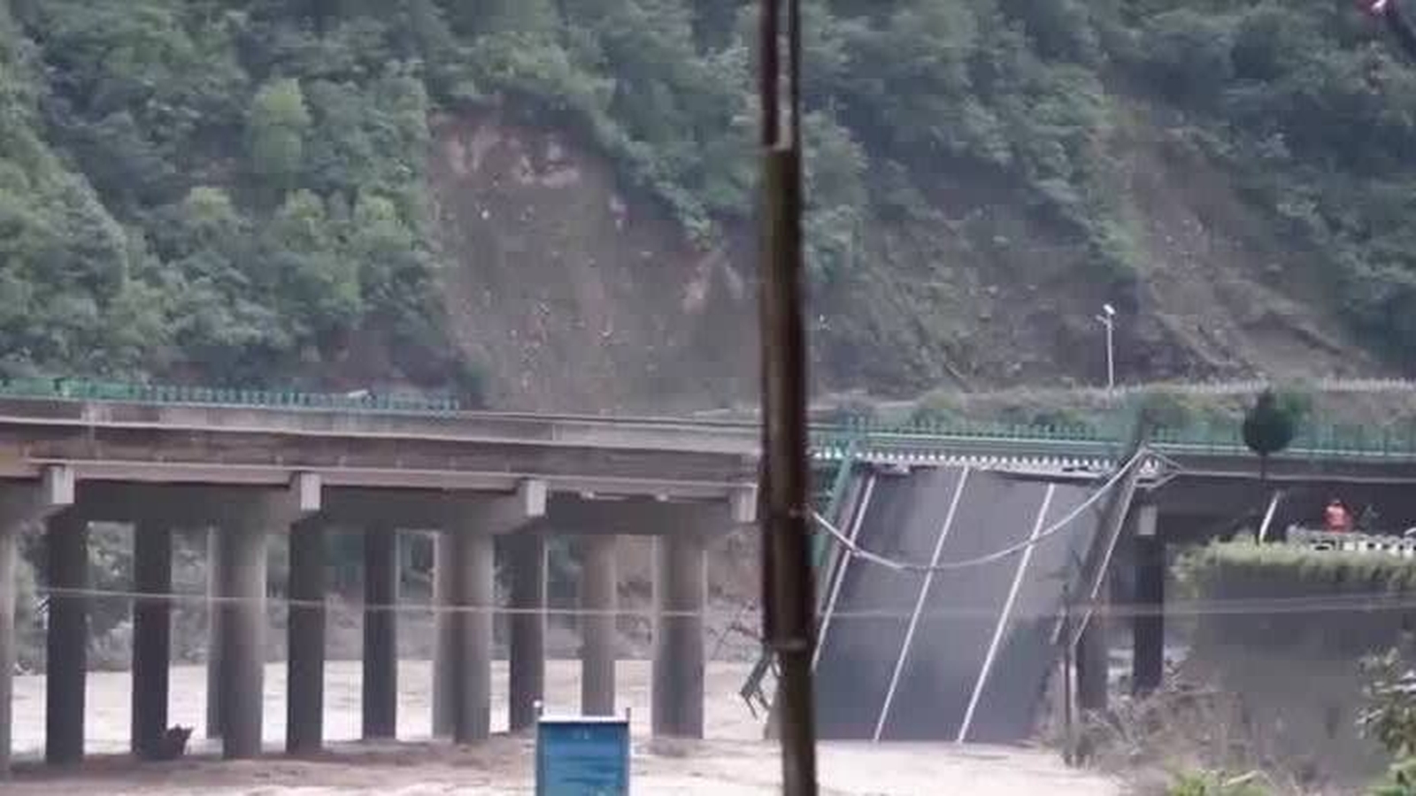 China bridge collapse kills 11 after torrential rains