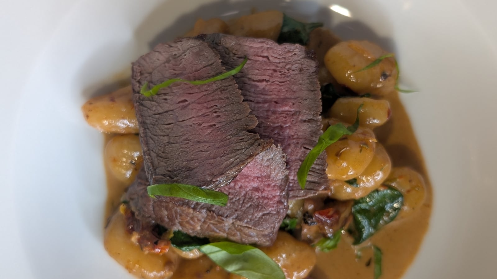Kev's Tuscan-style beef medallions with gnocchi